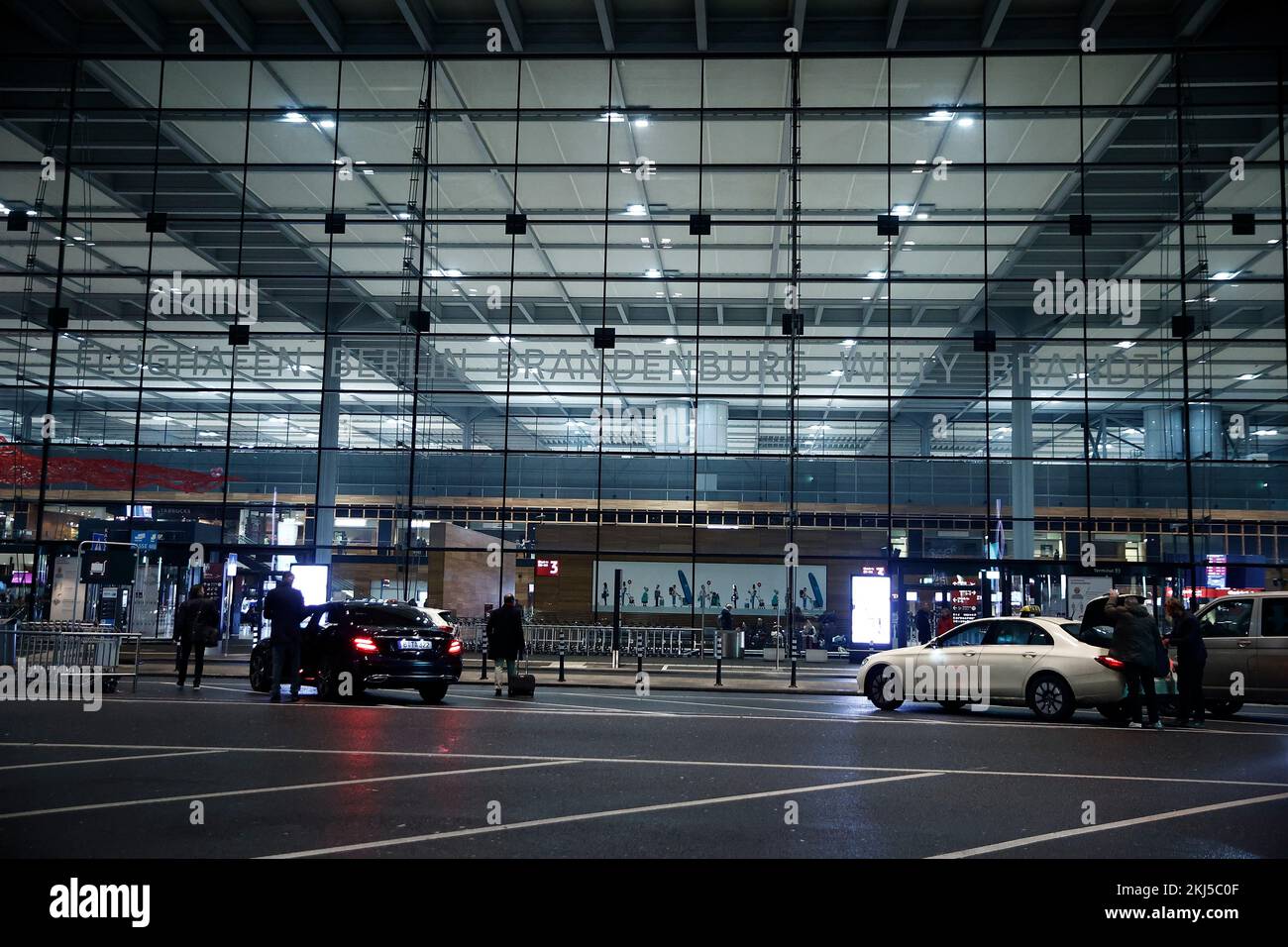 24 November 2022, Brandenburg, Schönefeld: Atos stand at BER airport ...