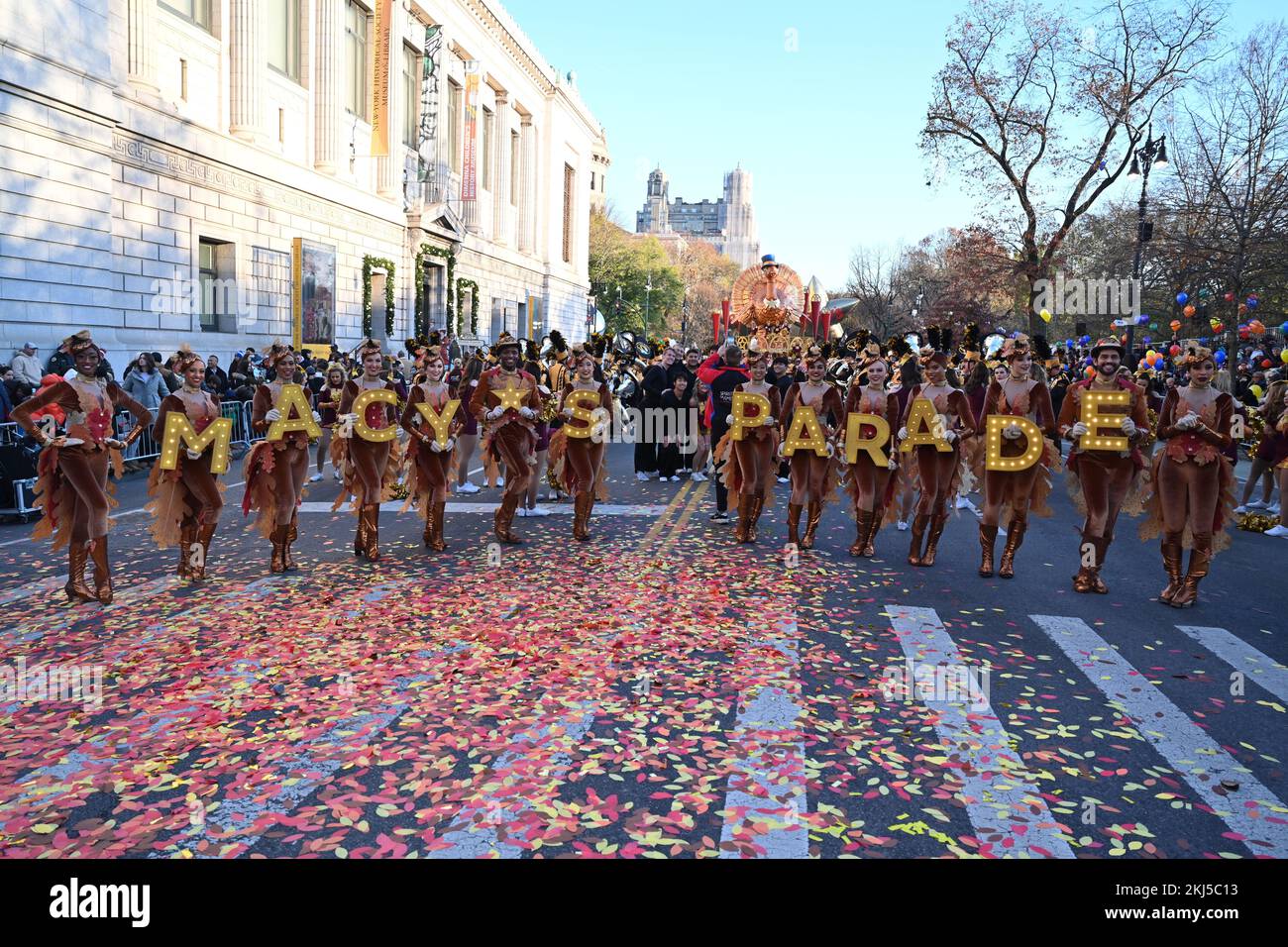 Performers march along the parade route during the 96th Macy's ...