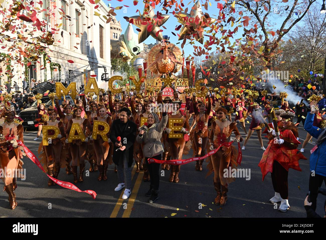 Performers march along the parade route during the 96th Macy's ...