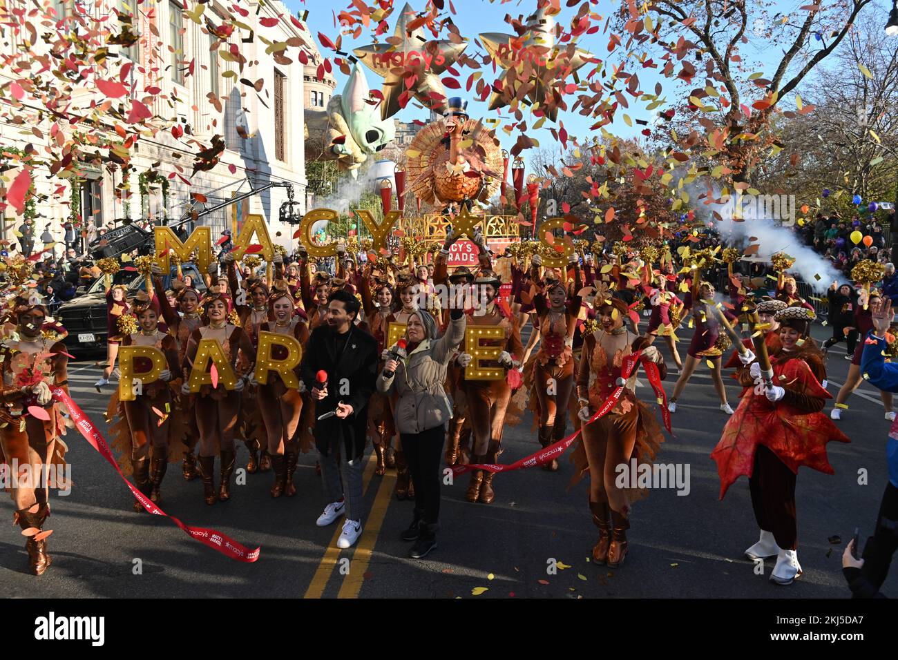 Performers march along the parade route during the 96th Macy's ...