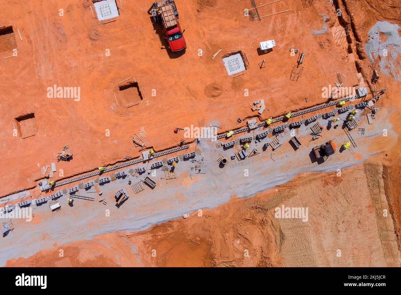 In large construction site, trenches are being prepared for pouring ...