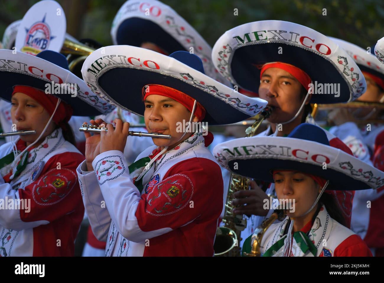Performers march along the parade route during the 96th Macy's ...