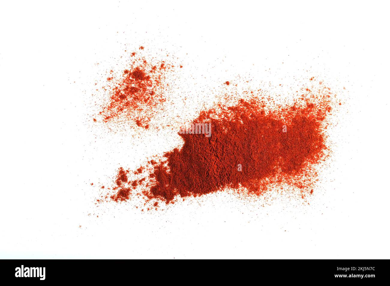 Pile of red paprika powder isolated on white background, top view Stock ...