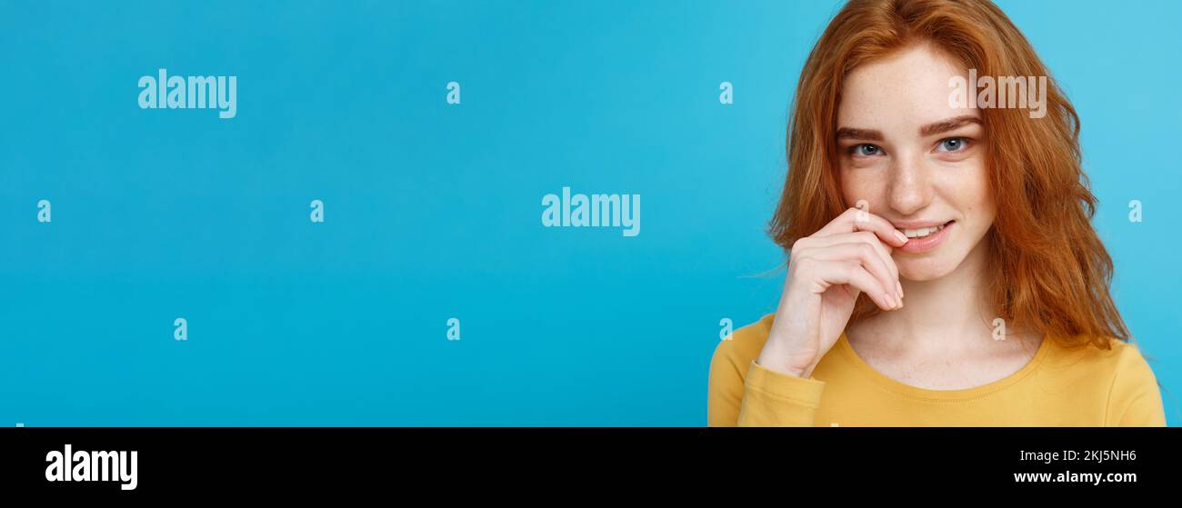 Headshot Portrait of happy ginger red hair girl with freckles smiling ...