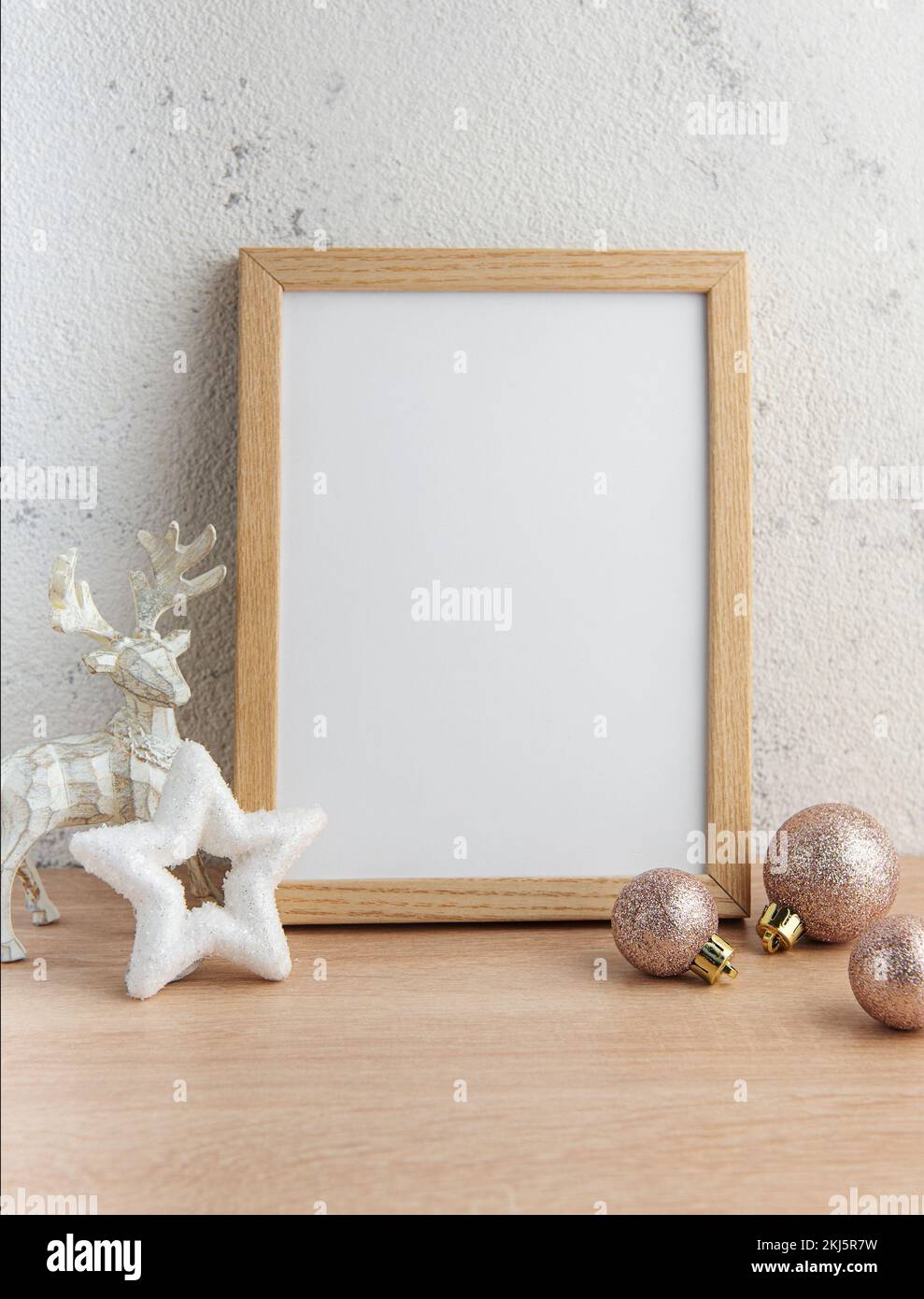 White blank wooden frame mockup with Christmas decorations on the ...