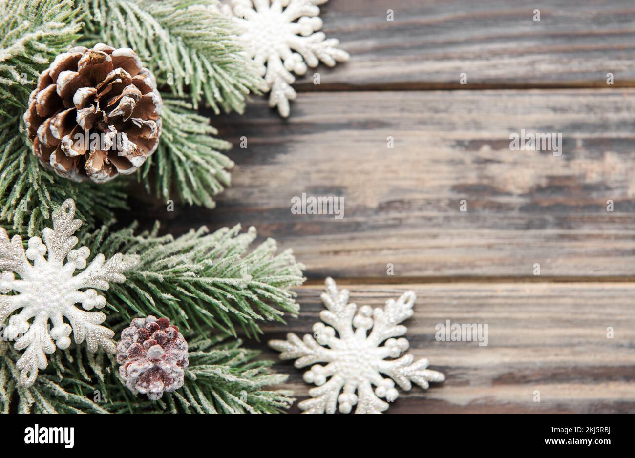 Christmas background with fir tree and decor on old wooden background ...