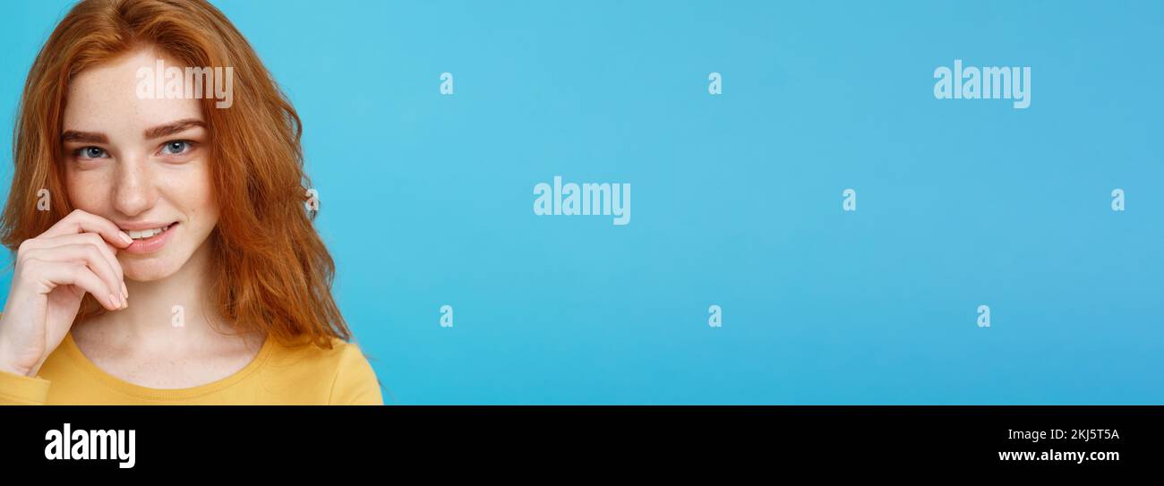 Headshot Portrait of happy ginger red hair girl with freckles smiling ...