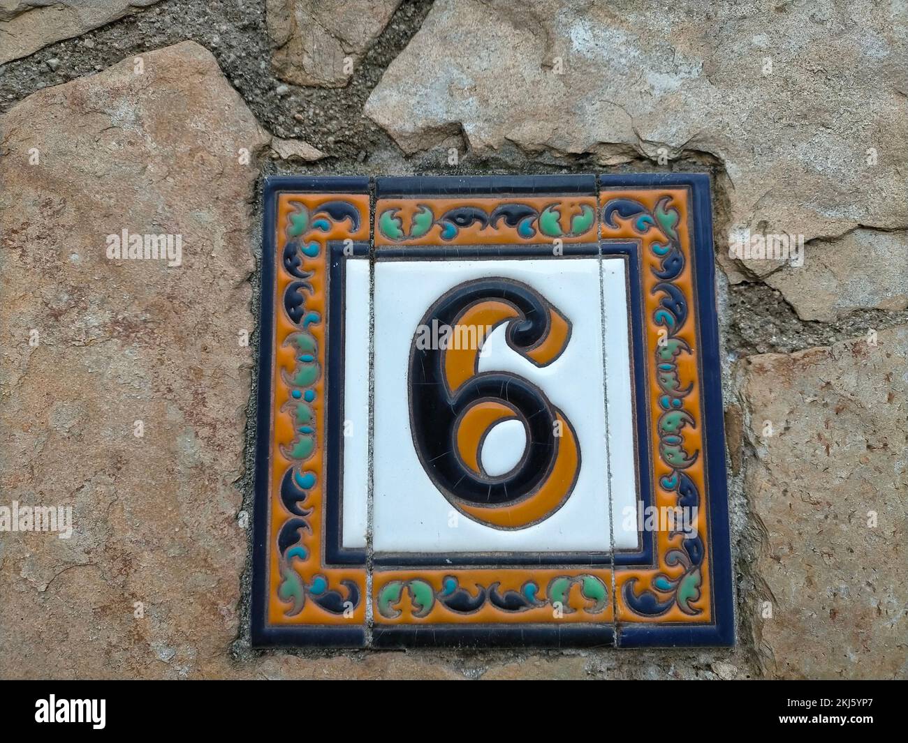 The number six (6) on a ceramic tile decorated with friezes Stock Photo ...
