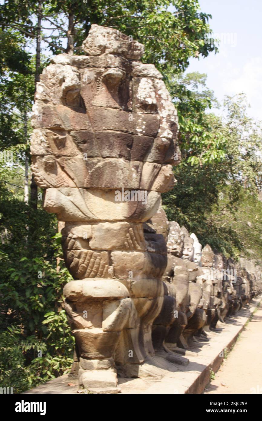 Naga and gods lining the causeway, Southern Gate, Bayon temple, Angkor ...