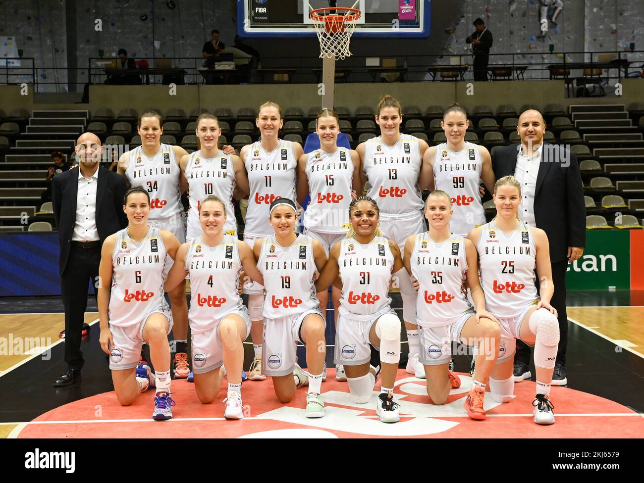Belgian Cats' players pose for the photographer and during a basketball ...