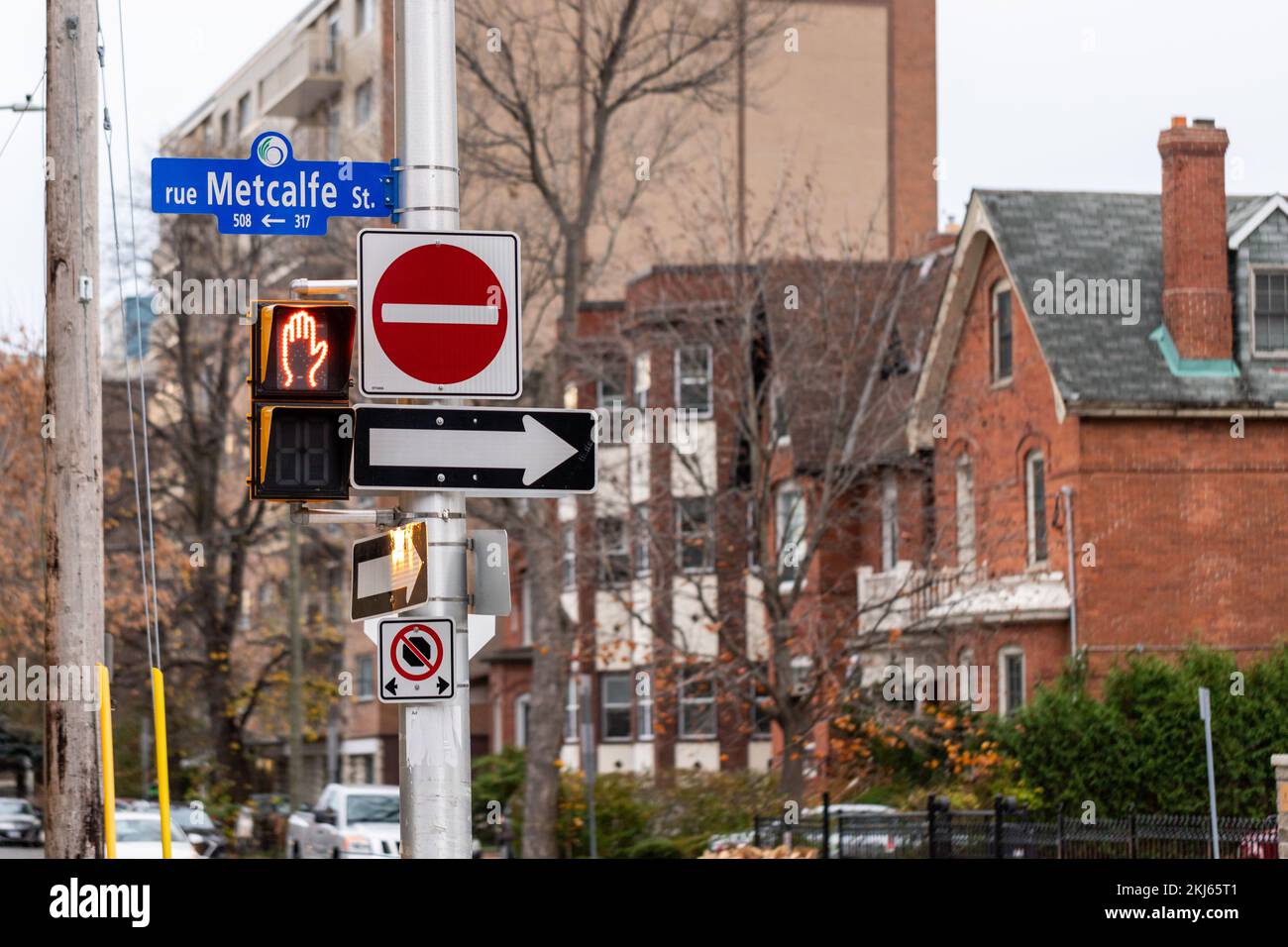 Ottawa, Canada - November 6, 2022: Red stop sign, arrow indicating the ...