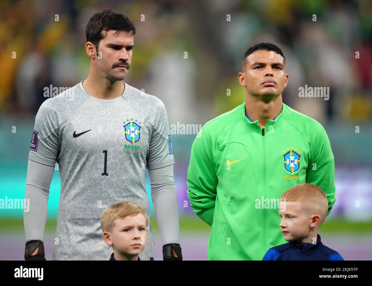Brazil goalkeeper Alisson (left) and Thiago Silva line up before the ...