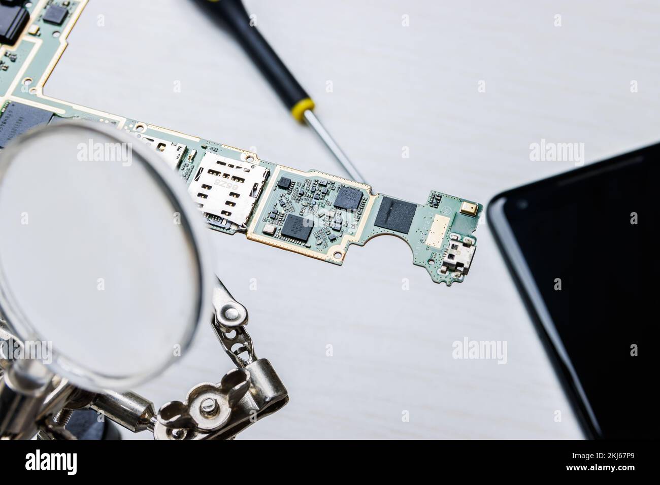 Mobile phone plate repair. Smart phone interior Stock Photo - Alamy