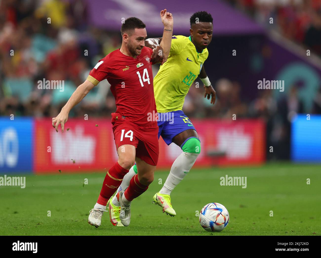 Doha, Qatar, 24th November 2022. Andrija Zivkovic of Serbia holds off ...
