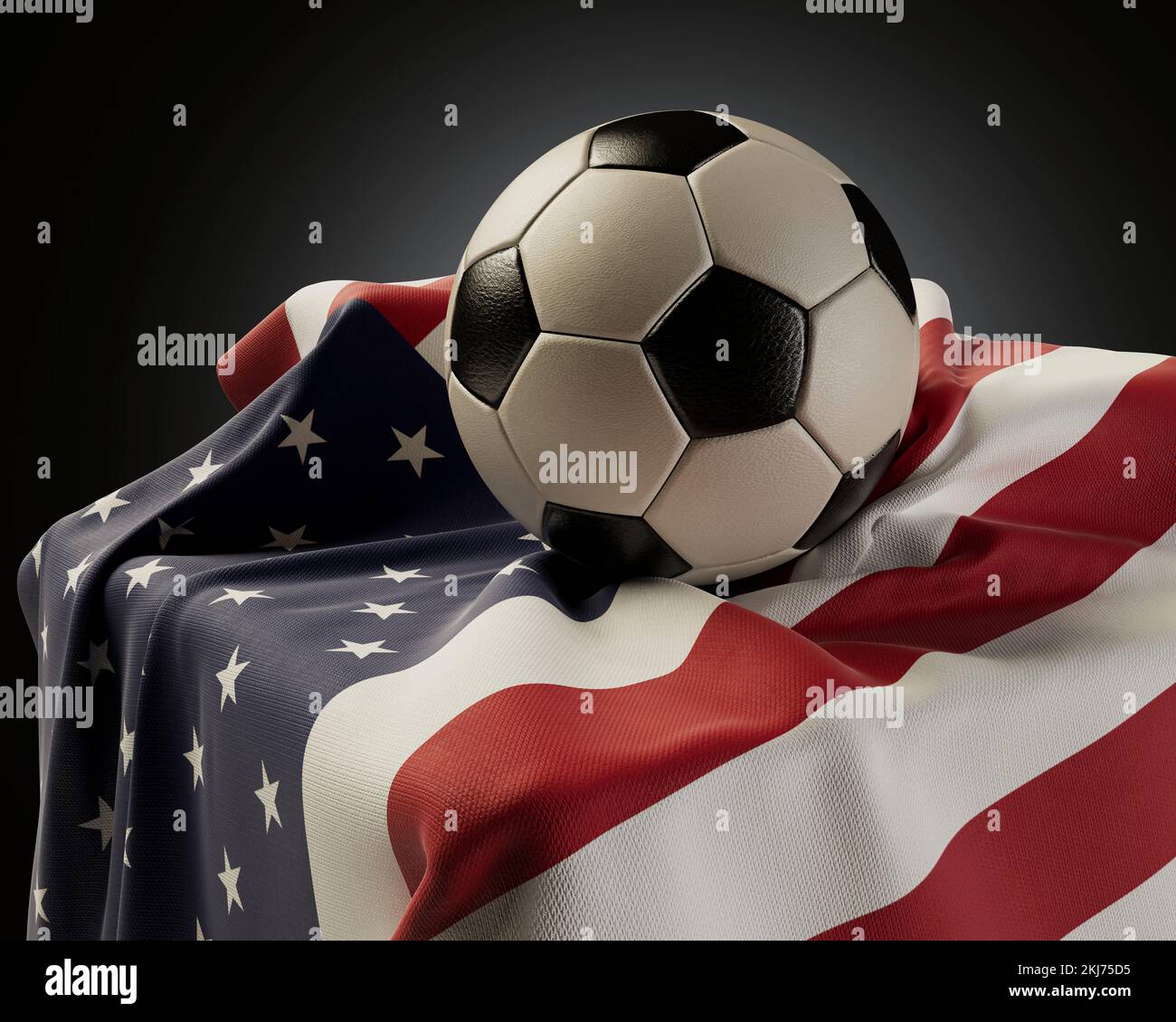 A regular soccer balls resting on a USA flag draped over a plinth on an ...