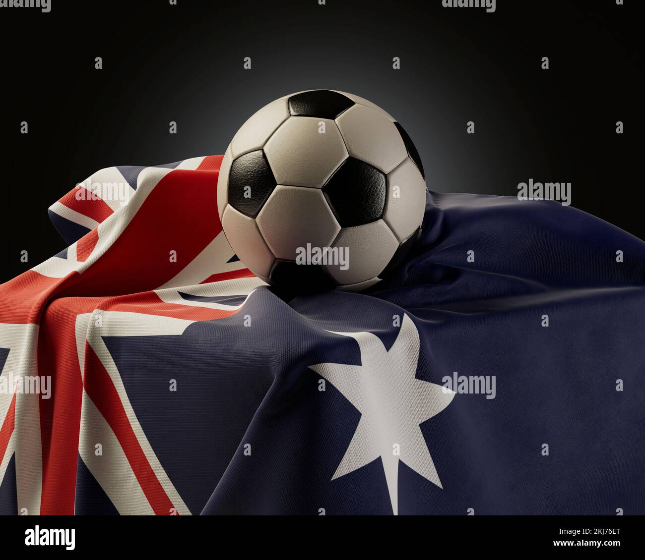 A regular soccer balls resting on an Australia flag draped over a ...
