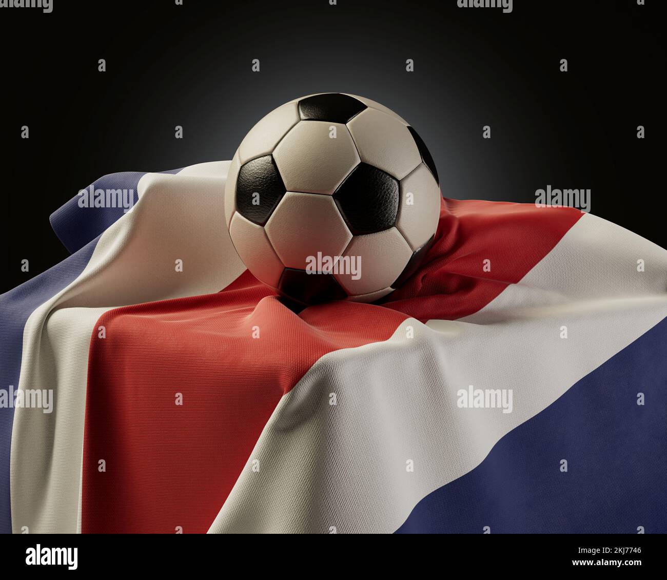 A regular soccer balls resting on a Costa Rica flag draped over a ...