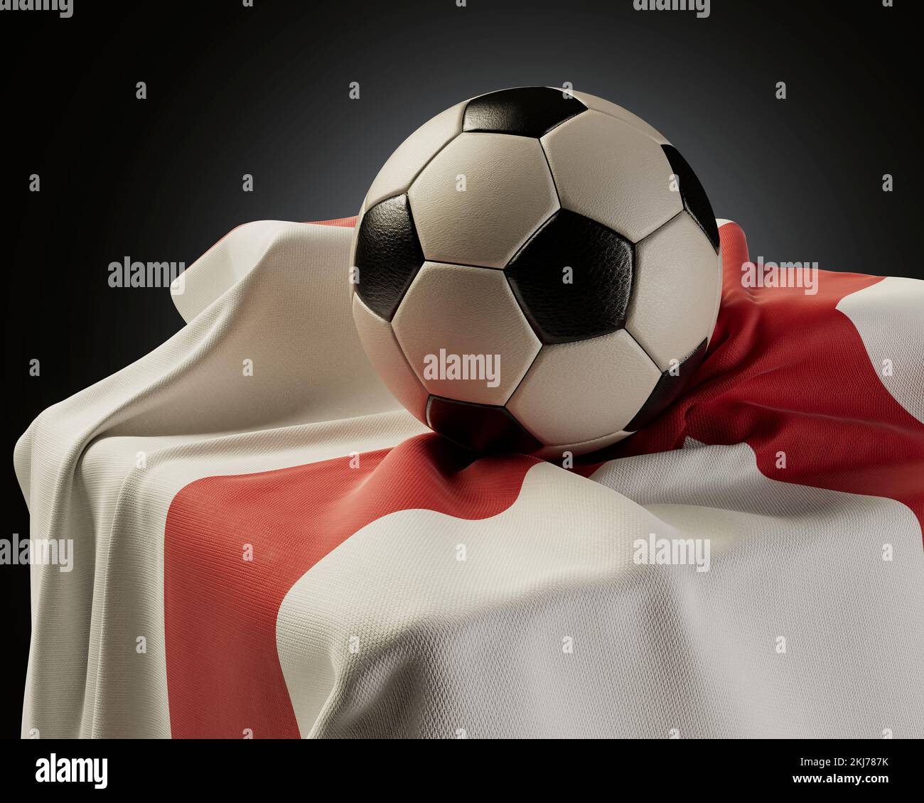 A regular soccer balls resting on a England flag draped over a plinth ...