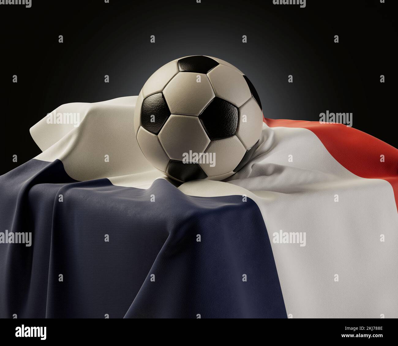 A regular soccer balls resting on a France flag draped over a plinth on ...