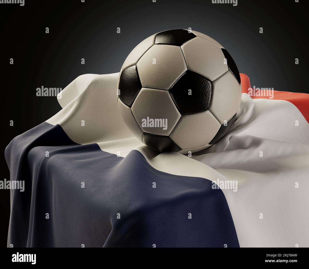 A regular soccer balls resting on a France flag draped over a plinth on ...