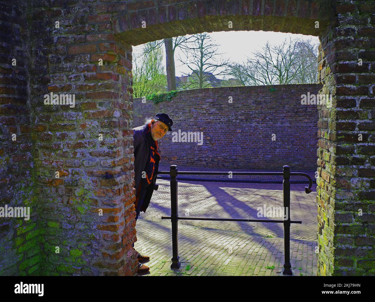 Man Cowering In Corner