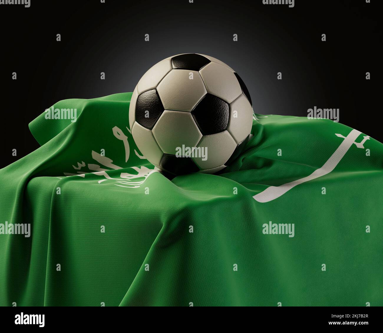 A regular soccer balls resting on a Saudi Arabia flag draped over a ...