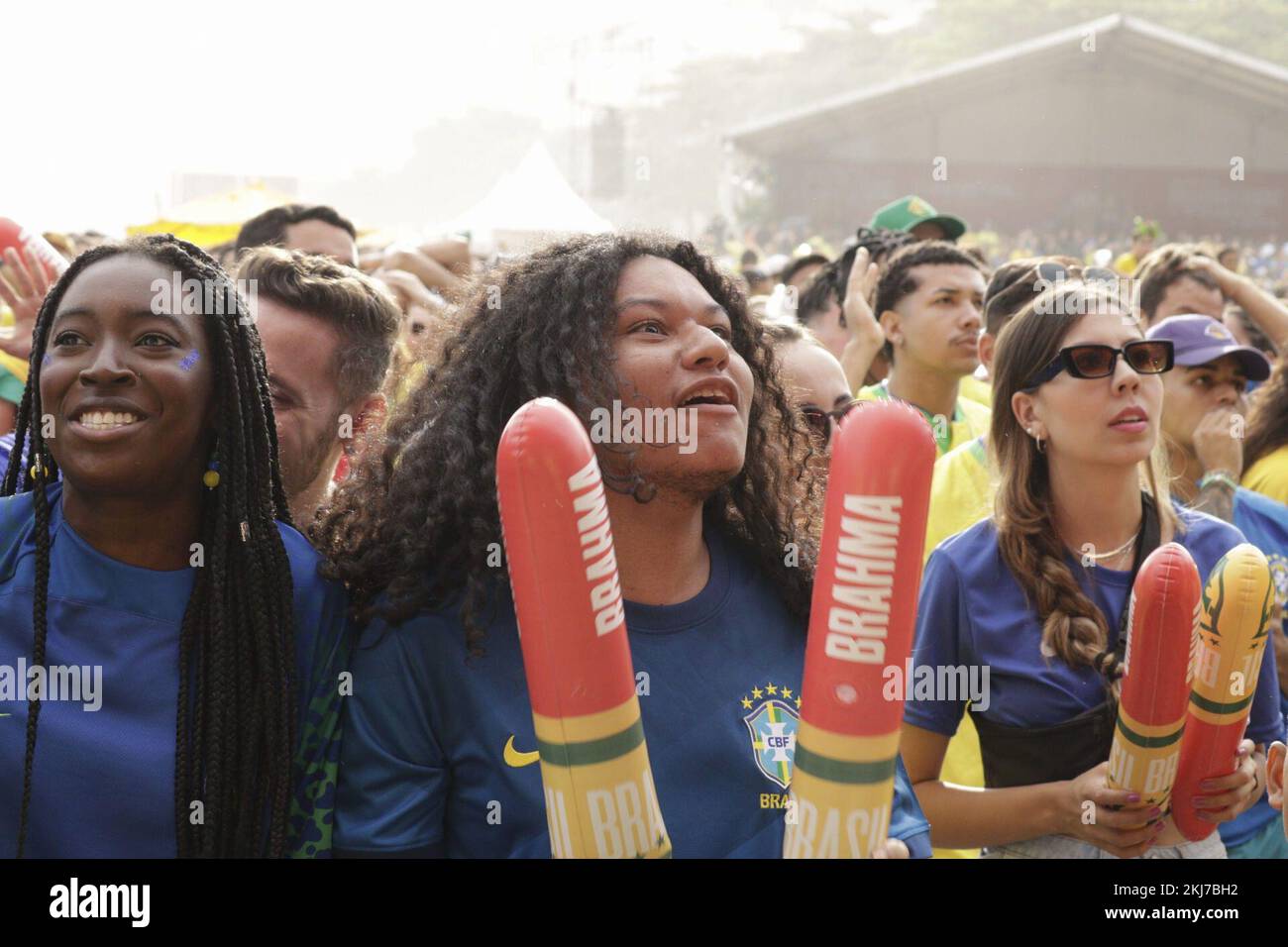Rio De Janeiro, Brazil. 24th Nov, 2022. Fans follow the first game of the Brazilian team against ...