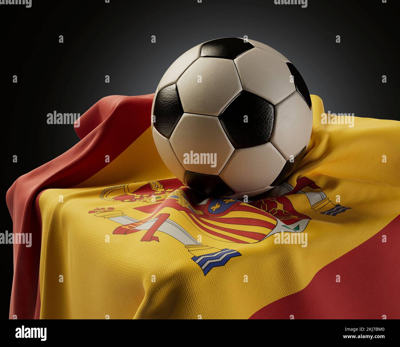 A regular soccer balls resting on a Spain flag draped over a plinth on ...