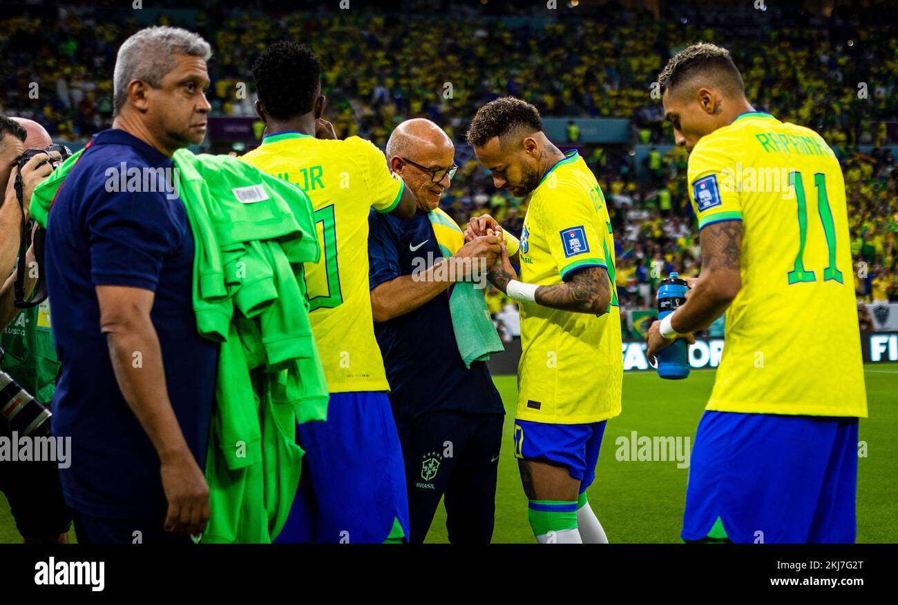 Doha, Qatar. 24th Nov, 2022. Neymar (Brazil) gets paste and smears it ...