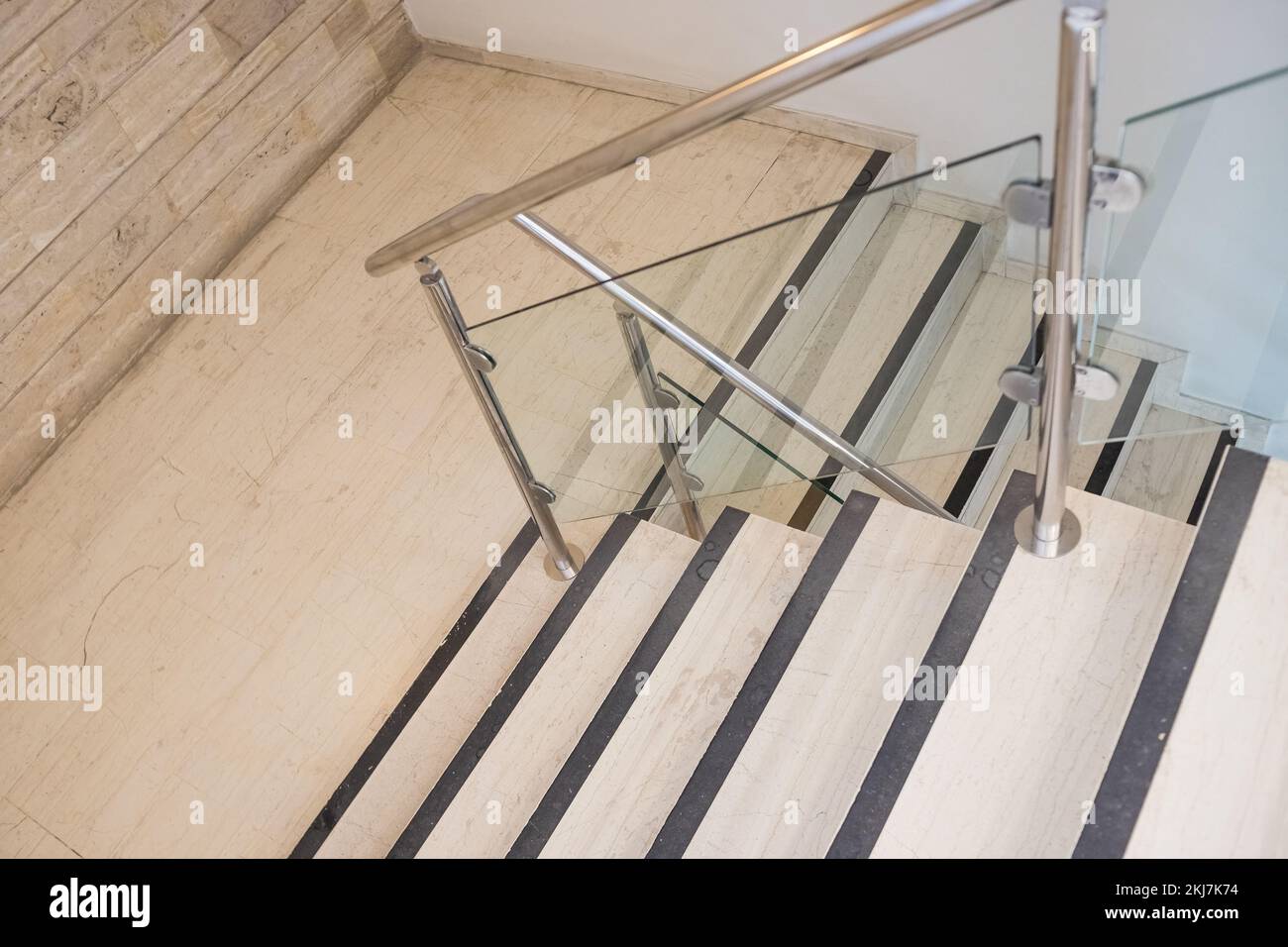 Modern architecture with marble stairs.marble staircase with glass ...