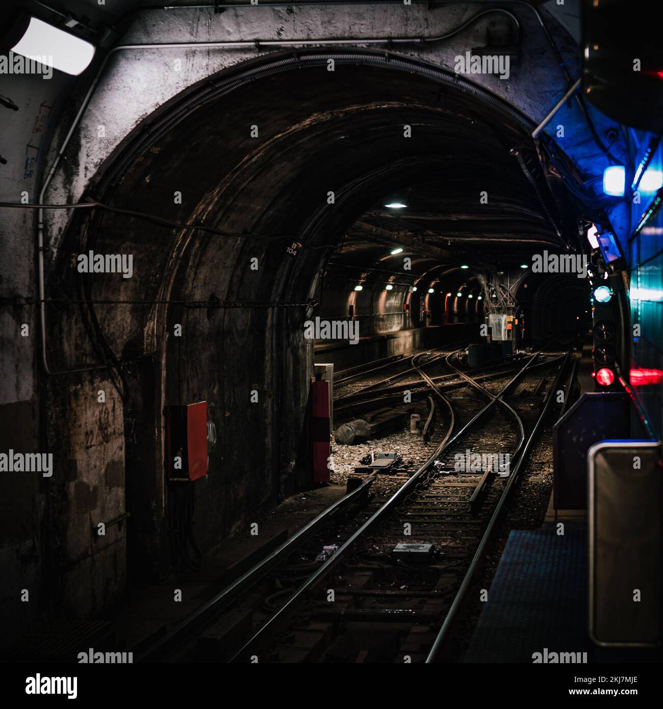 The old train tracks, railroad under a tunnel Stock Photo - Alamy