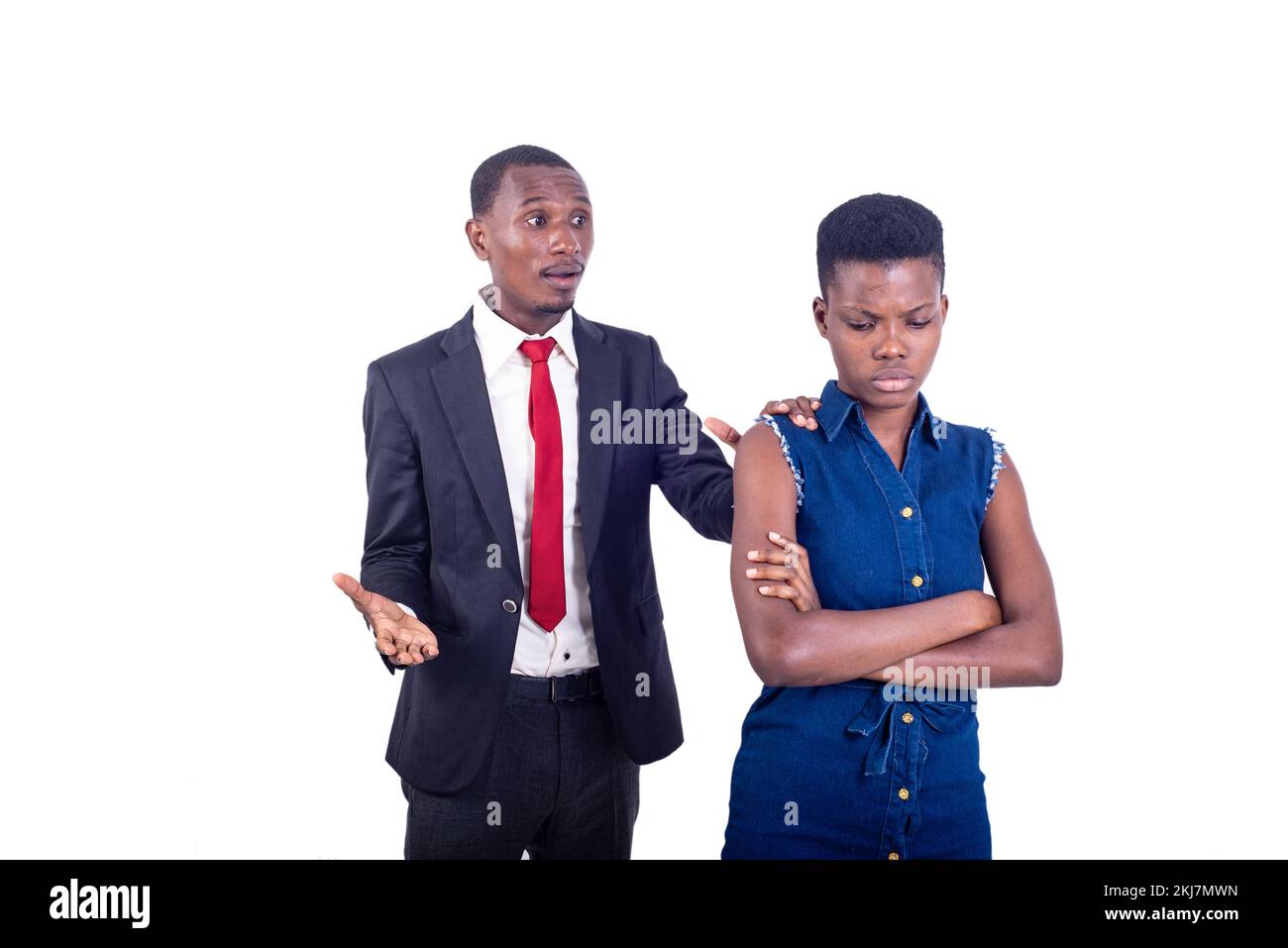 young man in jacket standing on white background arguing with his wife ...