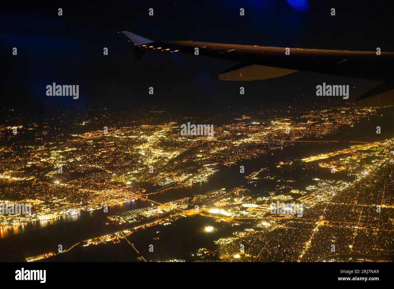 Fantastic view of the night city from a bird's eye view. The city is ...