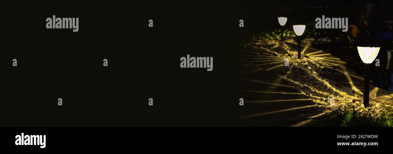 Decorative Small Solar Garden Light, Lanterns In Flower Bed. Garden ...