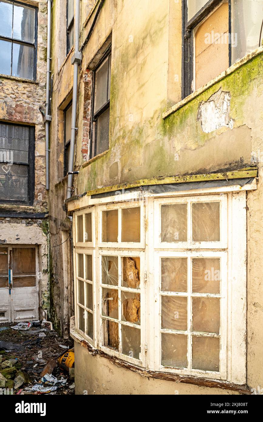 Derelict housing in town backstreet Stock Photo - Alamy
