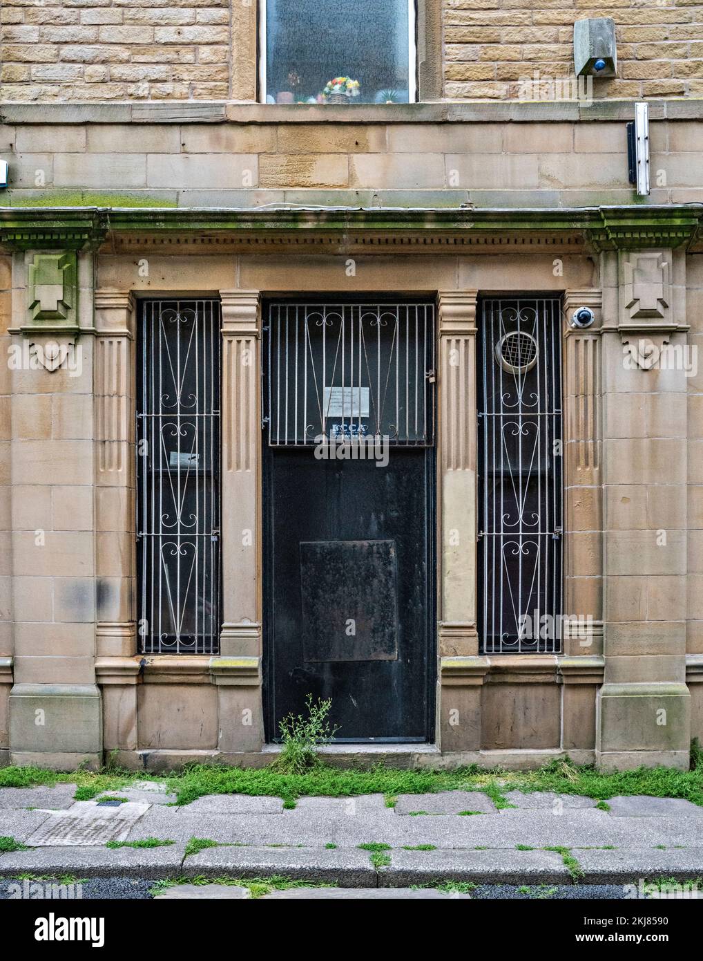 Black door of building on town street Stock Photo - Alamy