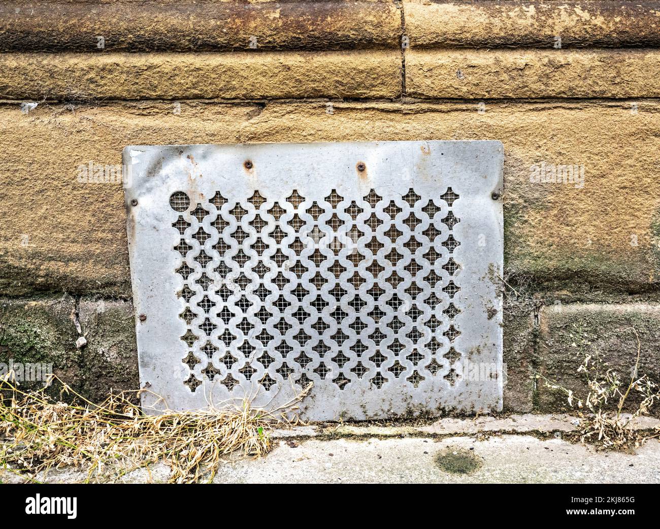 Perforated metal air vent Stock Photo - Alamy
