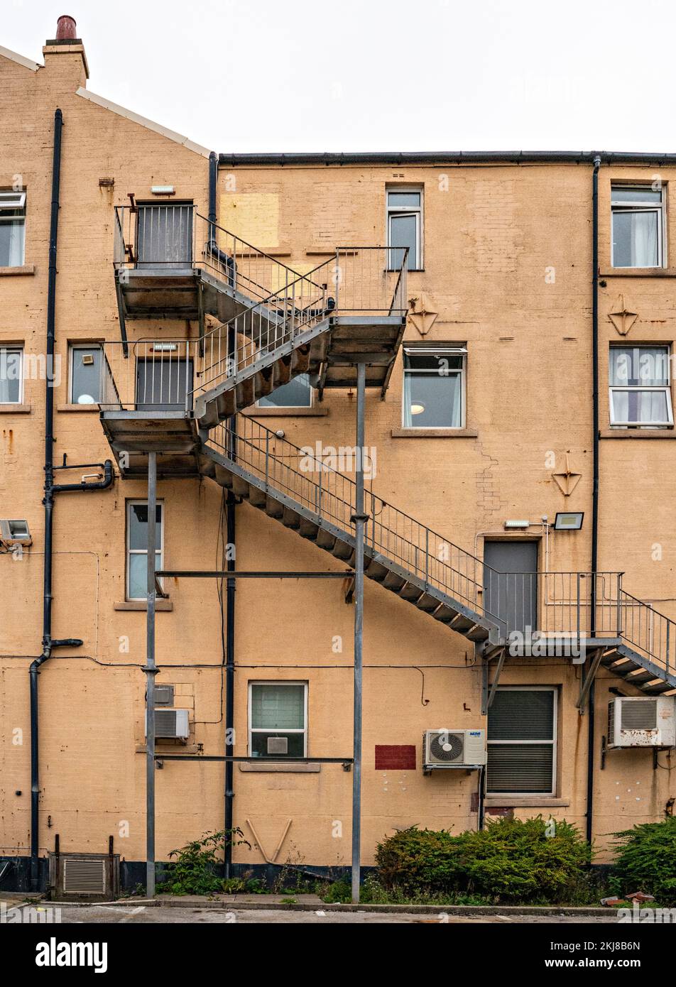 Fire escape on side of hotel building Stock Photo - Alamy
