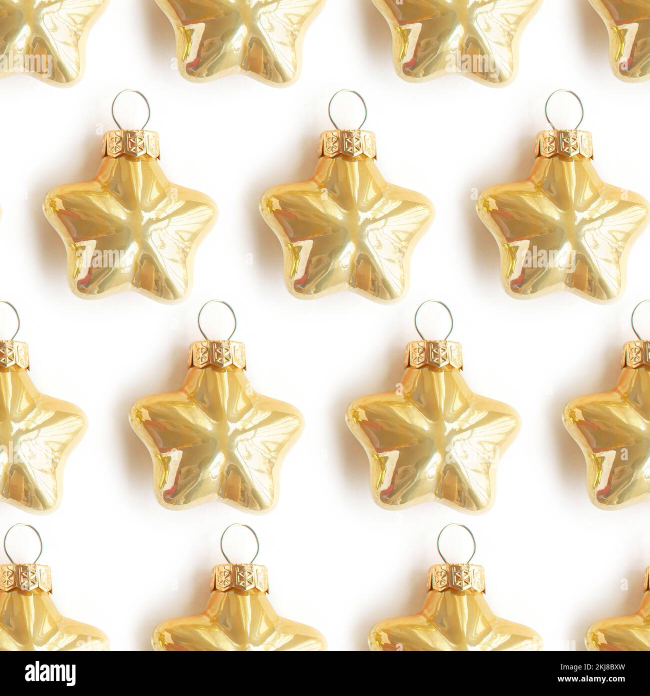 Seamless pattern with Christmas gold stars decorations on white ...