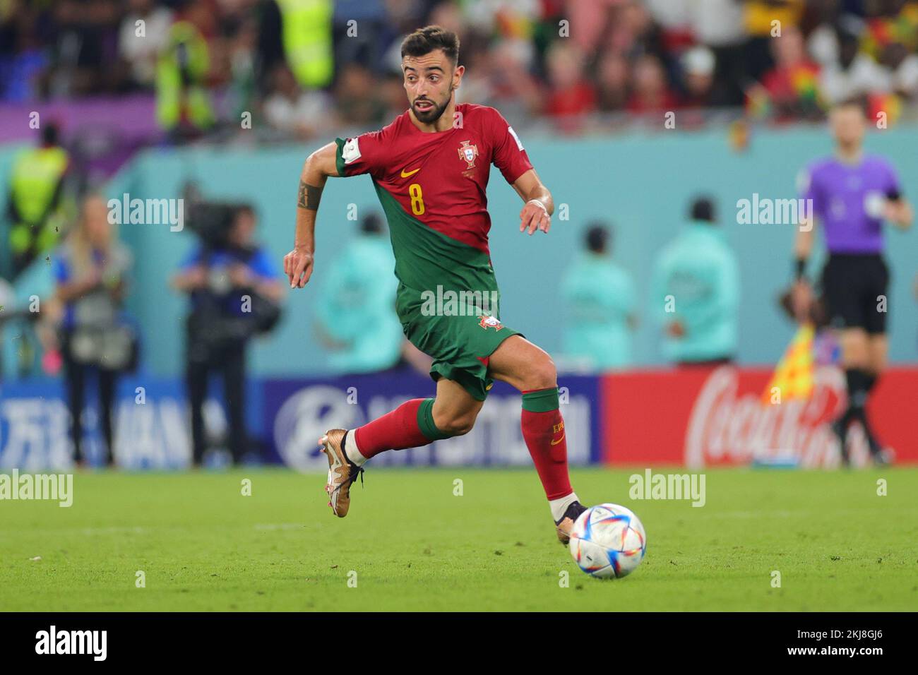 Doha, Qatar. 24th Nov, 2022. Bruno Fernandes of Portugal dribbles the ball during the FIFA World ...