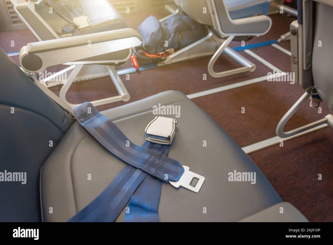 Airplane interior seatbelt hi-res stock photography and images - Alamy