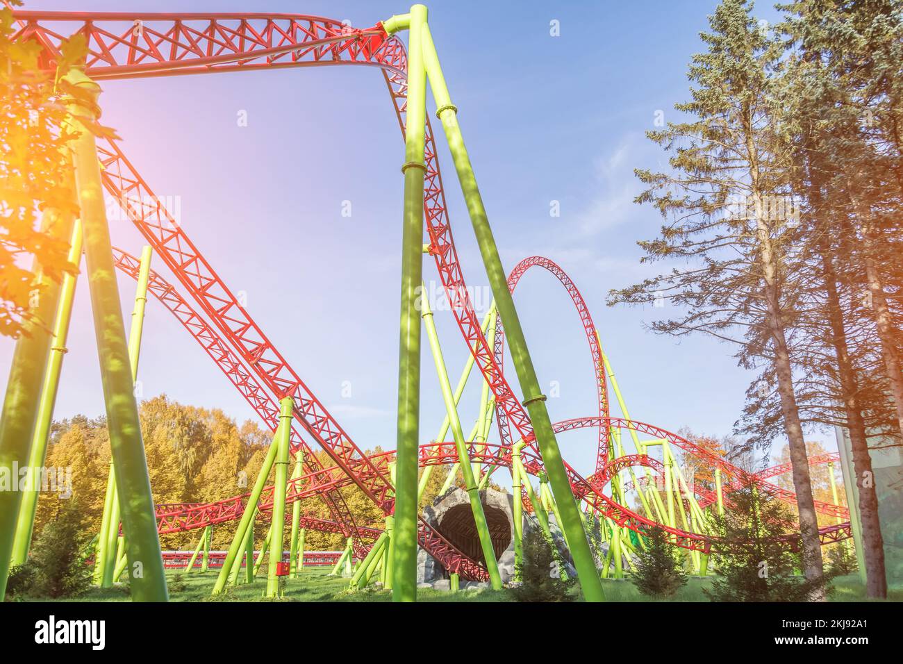Loop and turn on a roller coaster in an amusement park Stock Photo - Alamy