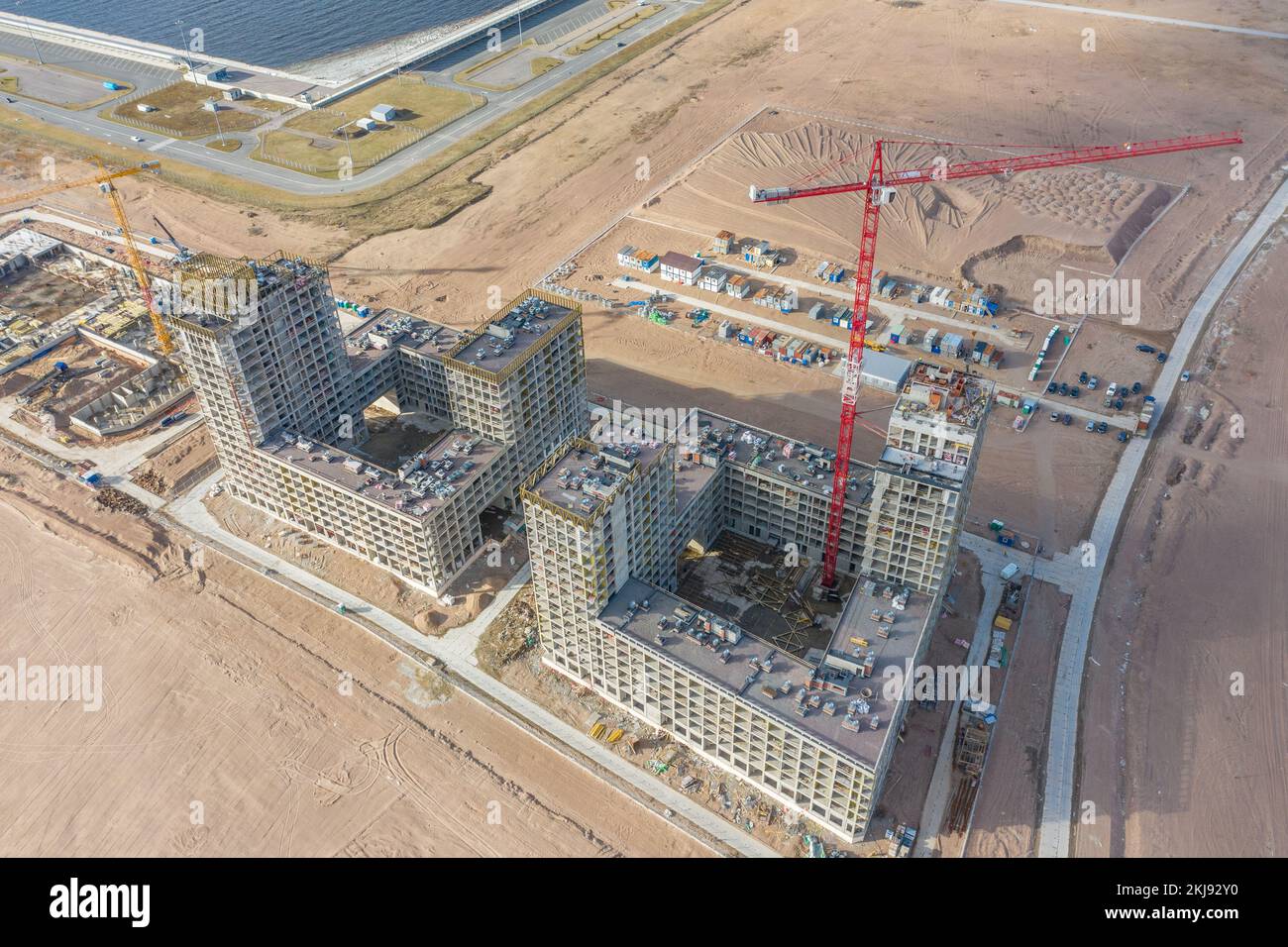 Aerial top view of high-rise residential buildings under construction ...