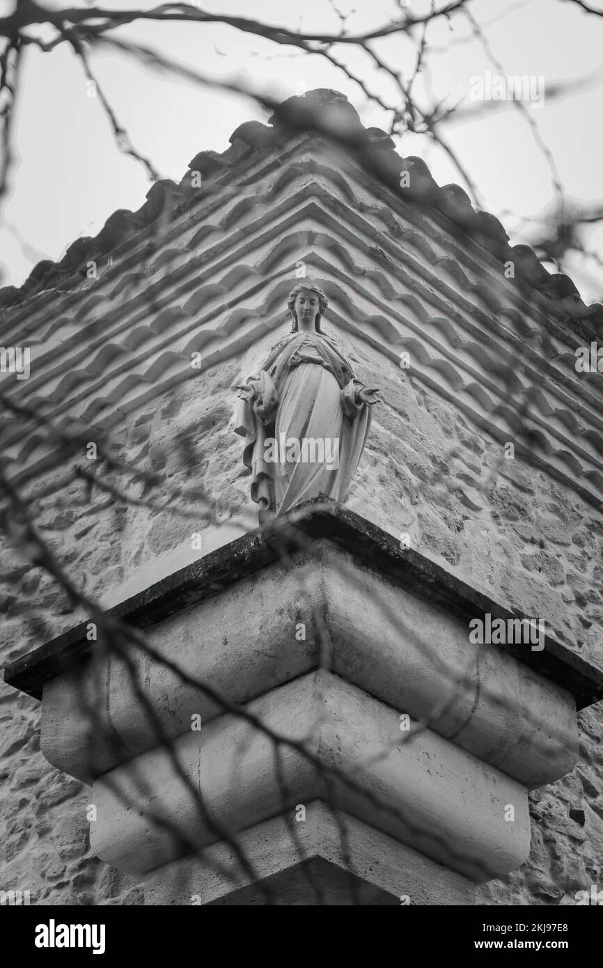 A grayscale shot of the Mary, mother of Jesus Stock Photo - Alamy