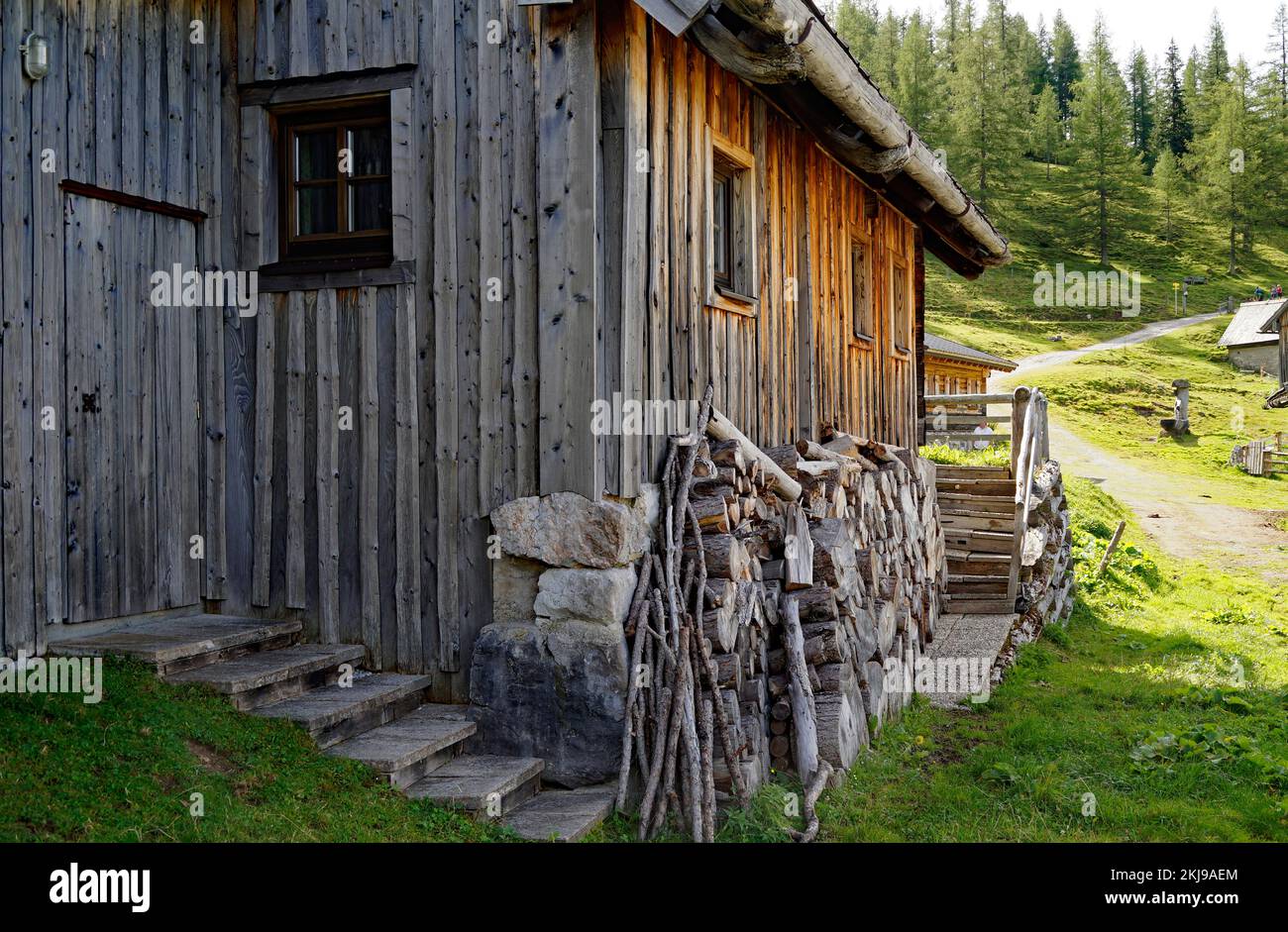 rustic wooden alpine cabin by foot of Dachstein mountain in alpine ...
