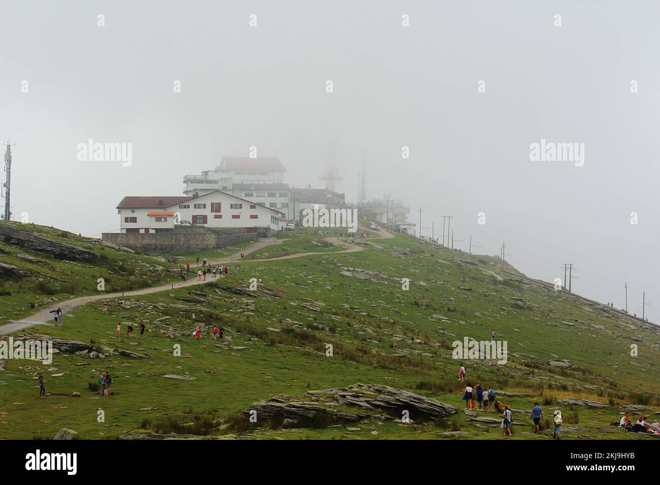 Summit of Larrun or La Rhune on a foggy day, in the border between ...