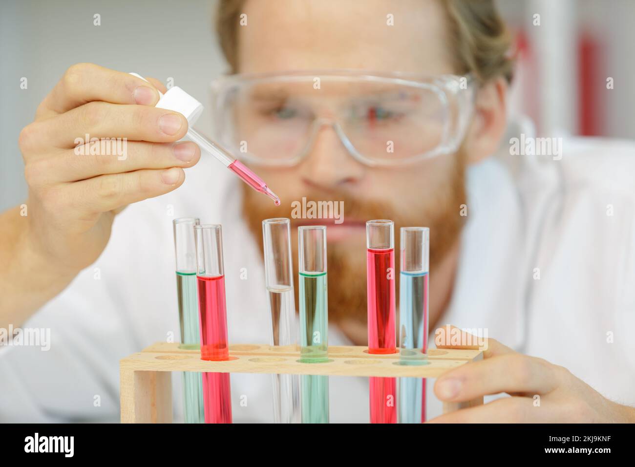 close view of male scientist using pipette Stock Photo - Alamy