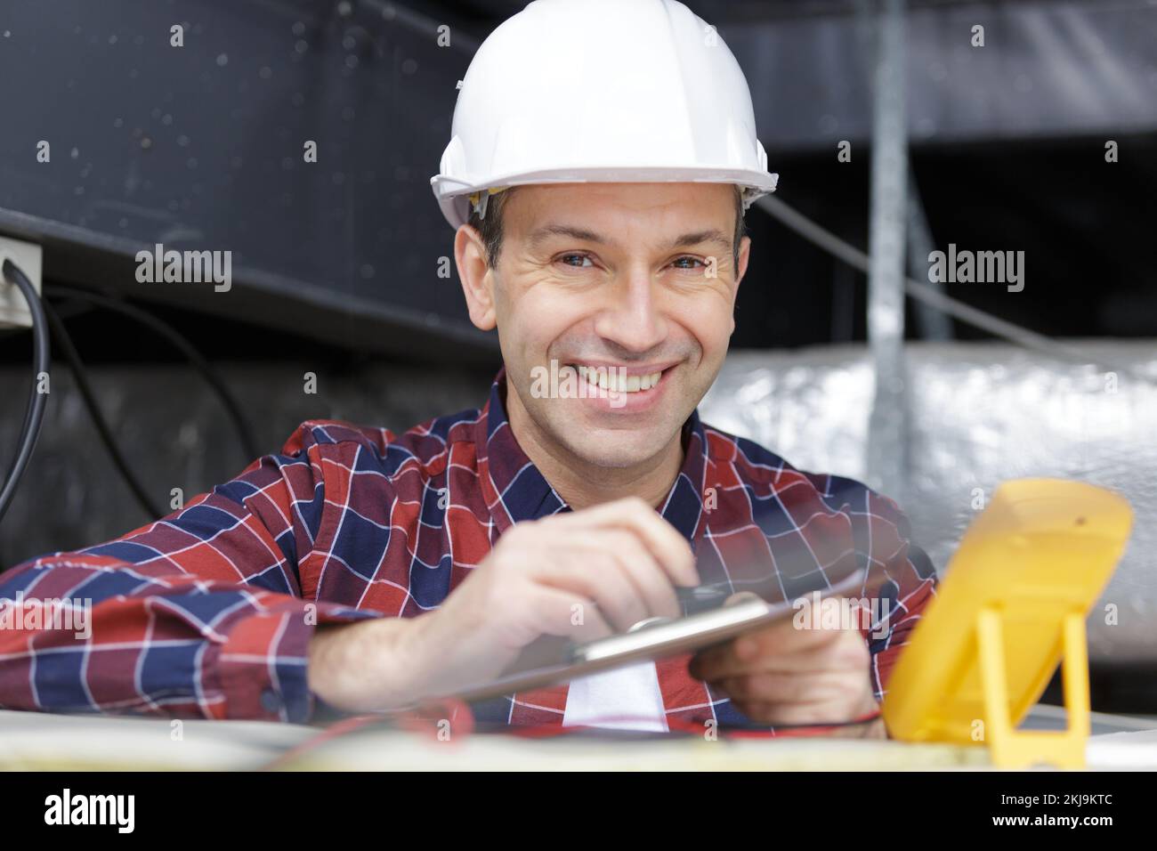 Concerned construction worker hi-res stock photography and images - Alamy