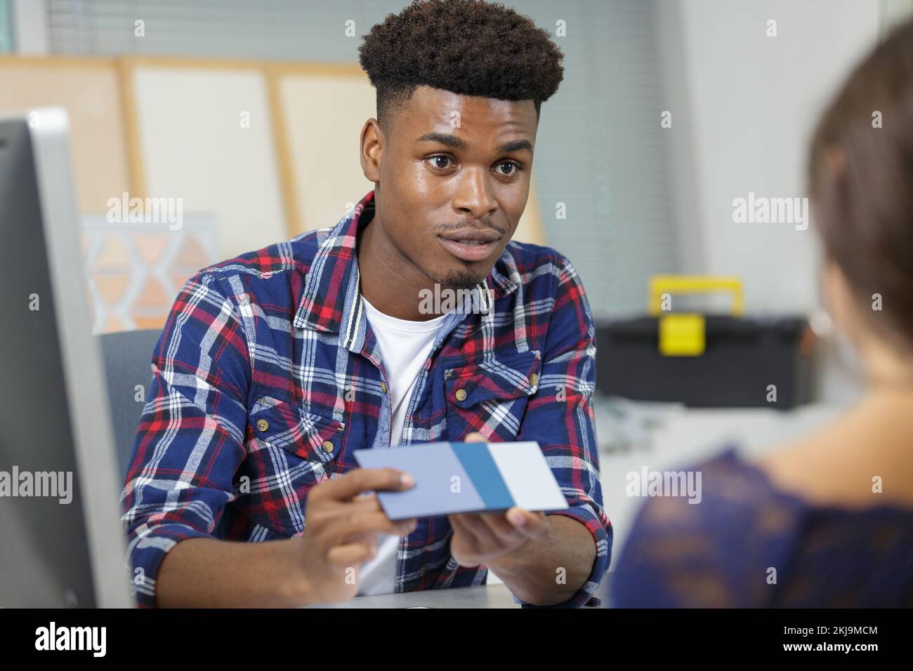 man holding sample stack of pvc Stock Photo - Alamy