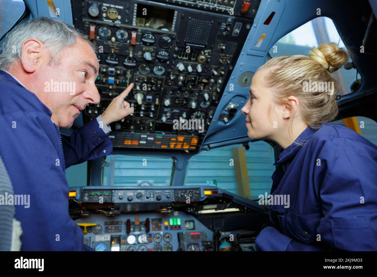Female pilot operating aircraft hi-res stock photography and images - Alamy